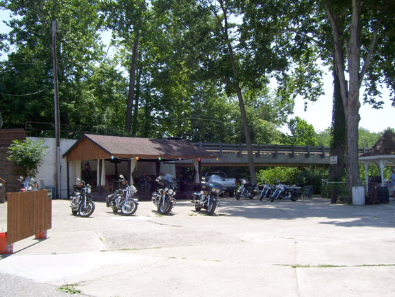 Photo Nuts World a motorcycle bar near the river
